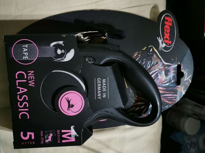 Поводок рулетка Flexi и одежда для собак