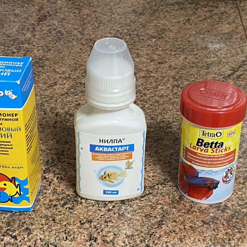 Кондиционер и корм для аквариумных рыбок